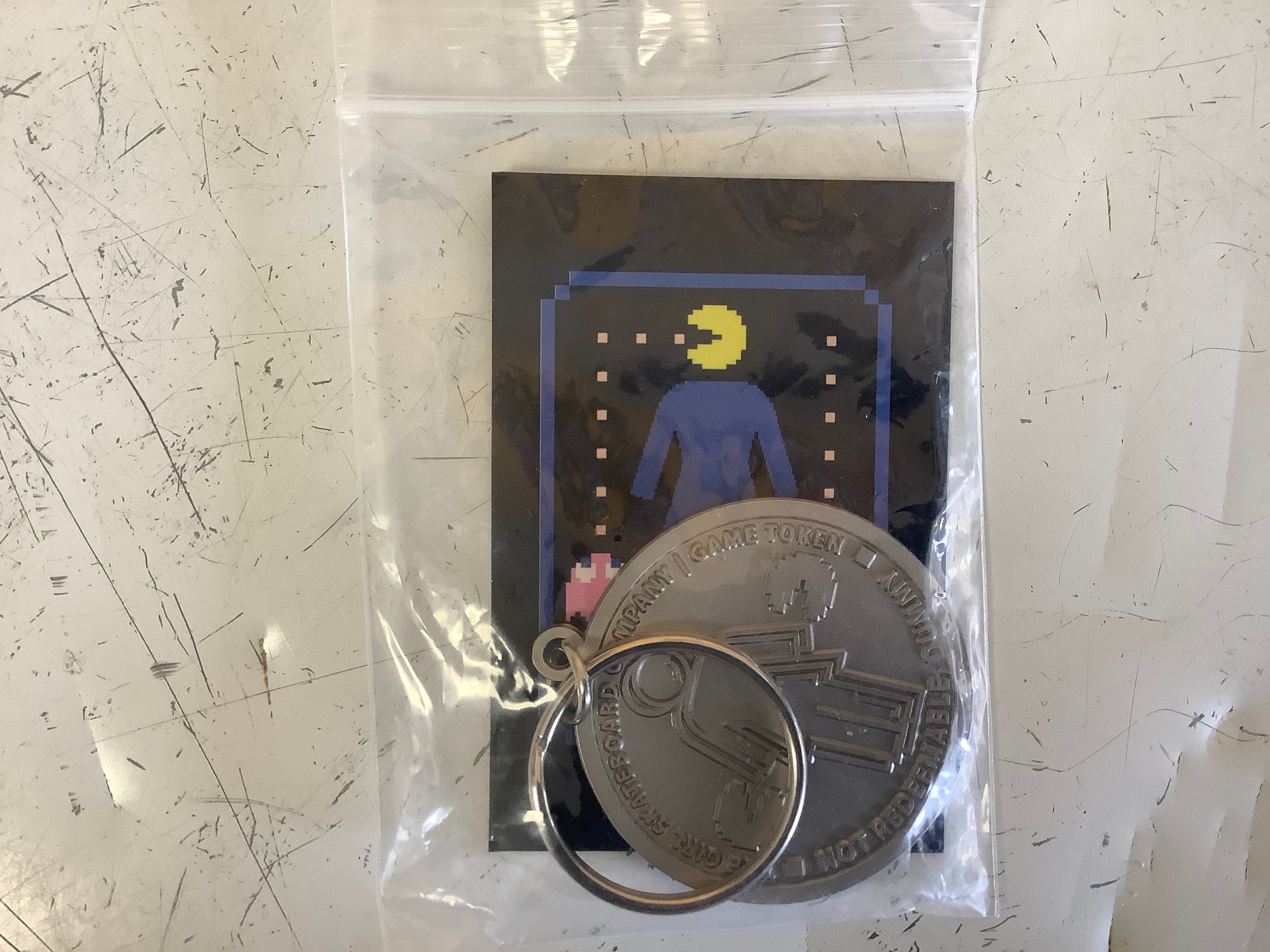 Girl Pac-Man game token keychain – Rowan Skate Center